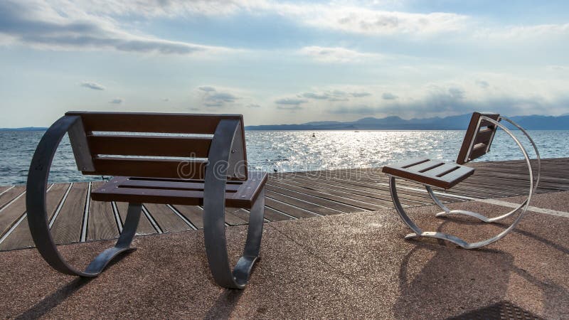 Chairs Overlooking the Lake Garda Stock Image - Image of bench ...