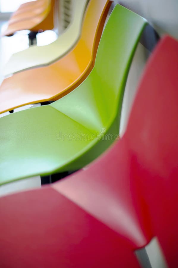 Chairs, Plastic, Fixed in a Row of Different Colours Stock Image ...