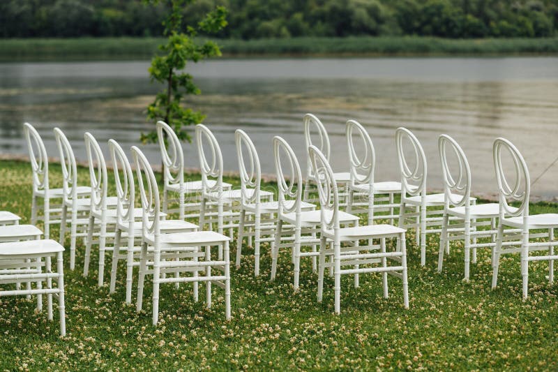 Chairs Set Up by the Green Lawn in Preparation for a Wedding Reception ...