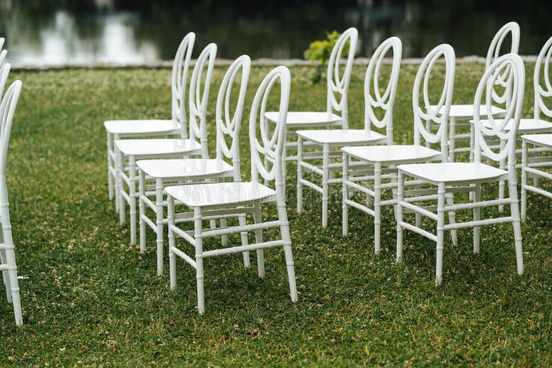 Chairs Set Up by the Green Lawn in Preparation for a Wedding Reception ...