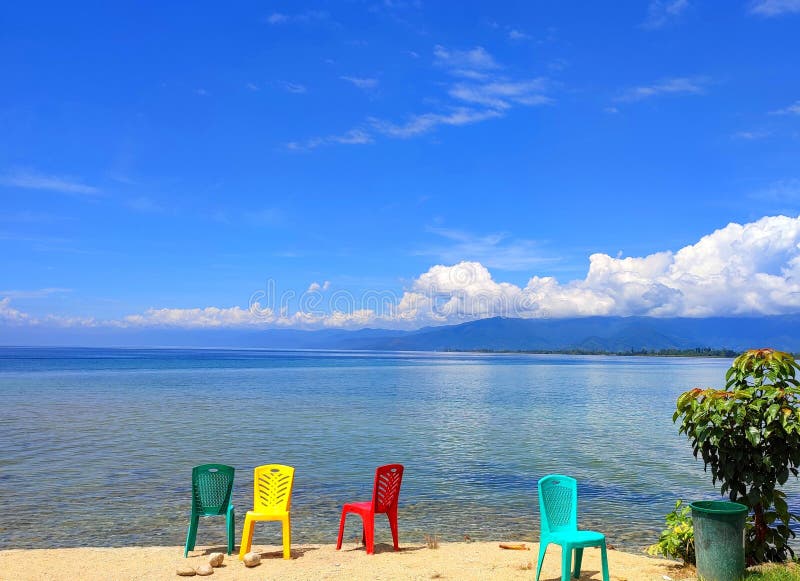 Sitting on the Edge of Poso Lake Stock Photo - Image of shores, lake ...