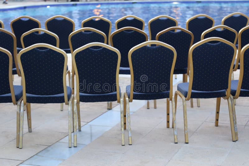 Chairs stand in rows stock photo. Image of crowd, event - 123803438