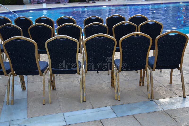 Chairs stand in rows stock image. Image of rows, pattern - 124030585