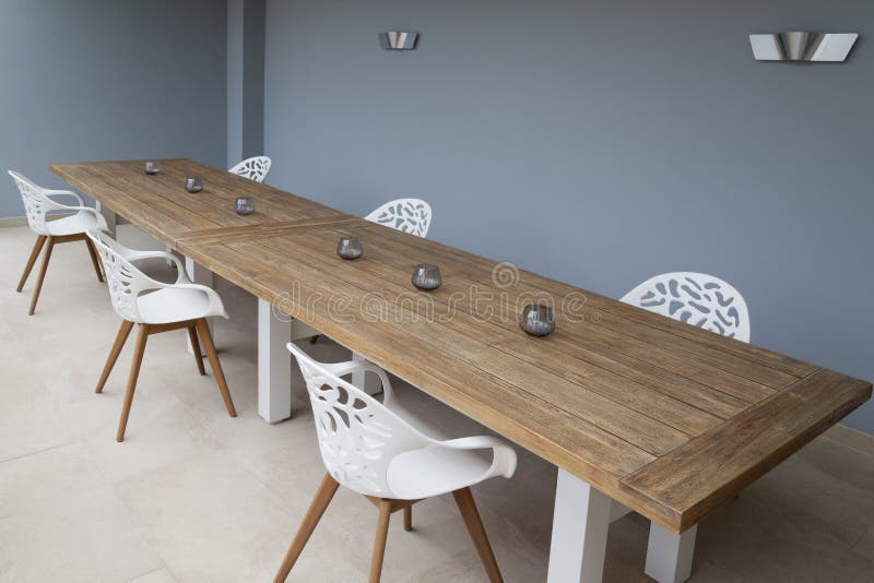 Chairs at a Table with Gaps for Social Distancing Stock Image - Image ...