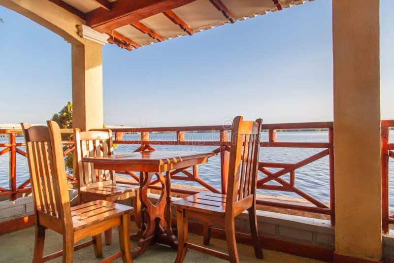 Chairs and Table on Terrace with Sea Views Stock Photo - Image of ...