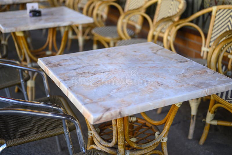Chairs and Tables on the Sidewalk in Front of a Cafe Stock Image ...