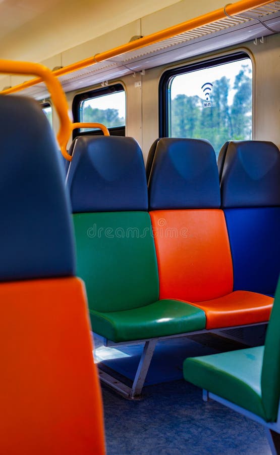 Colored Chairs in the Train Stock Photo - Image of table, bright: 219613702