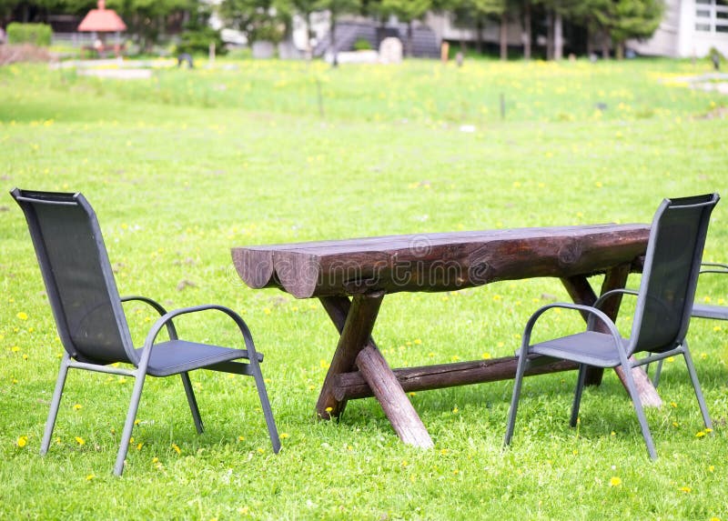 Chairs and Wooden Table Outdoors in Nature Stock Image - Image of trunk ...