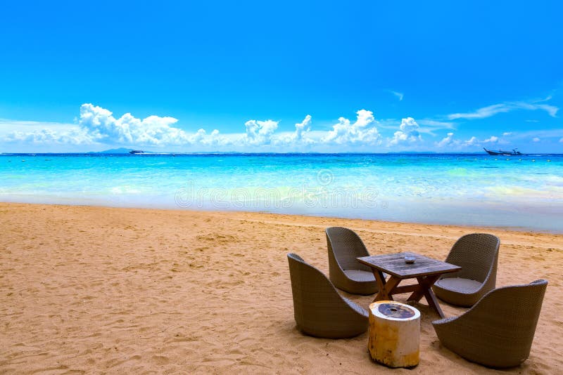 Chairs and Wooden Table Set on Sandy Beach Stock Photo - Image of sand ...