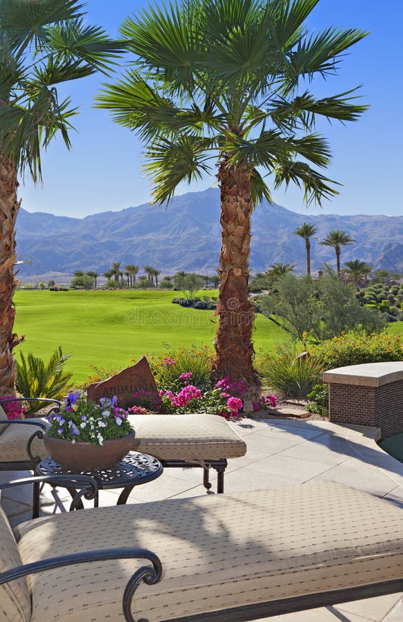 View of Chaise Lounges at Poolside of Luxury Mansion Stock Photo ...