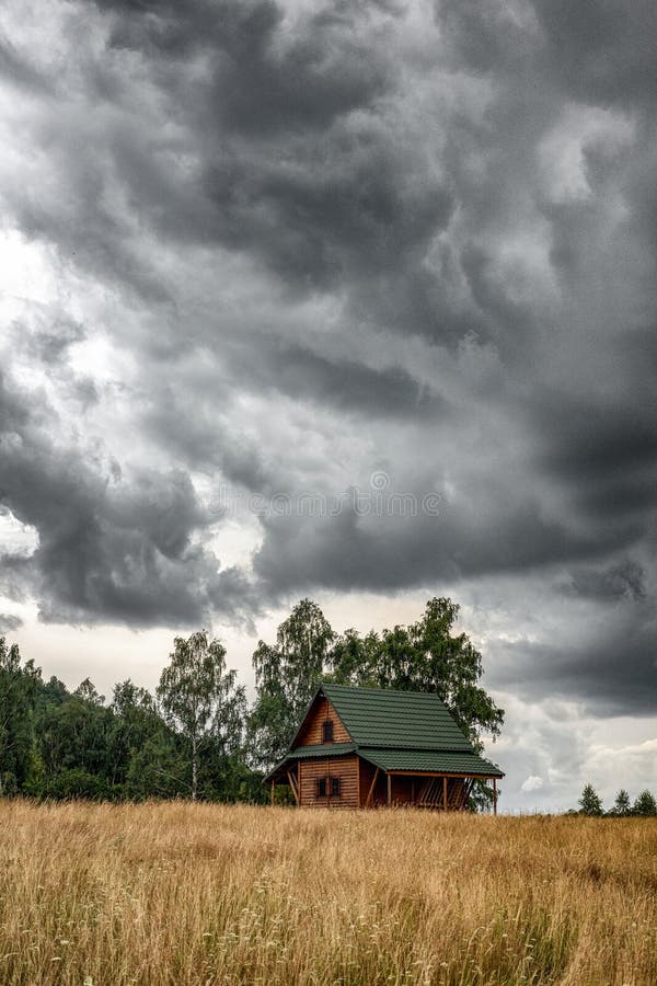 Chalet in Country Stormy Clouds on the Dark Sky Stock Image - Image of ...