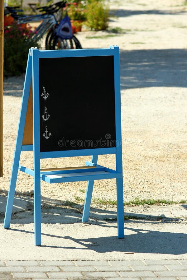 Chalk board easel for menu stock photo. Image of display - 220795672