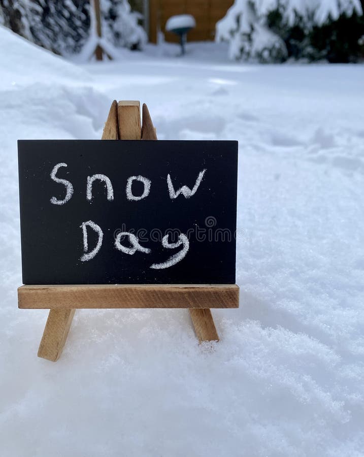 Chalk Board in the Snow with the Words Snow Day Stock Image - Image of ...