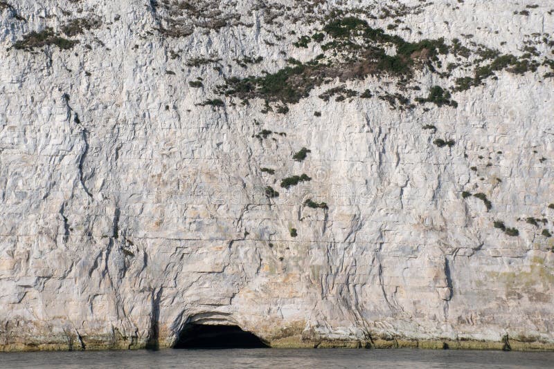 Chalk Cliff Face with Cave at Bottom Stock Photo - Image of landscape ...