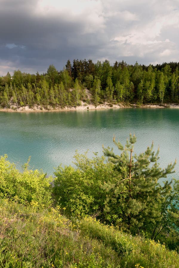 Chalk Quarry Filled with Water in Belarus. Stock Image - Image of ...