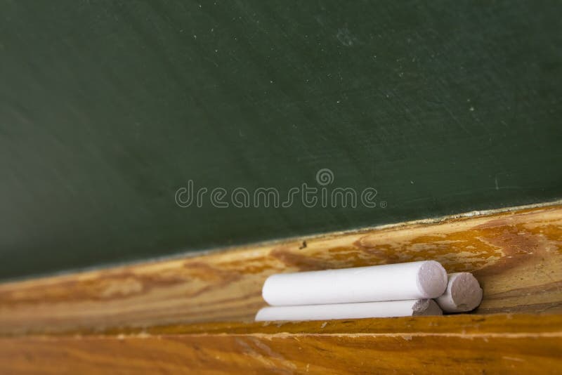 Chalk Sticks in a School Board Stock Photo - Image of school, closeup ...