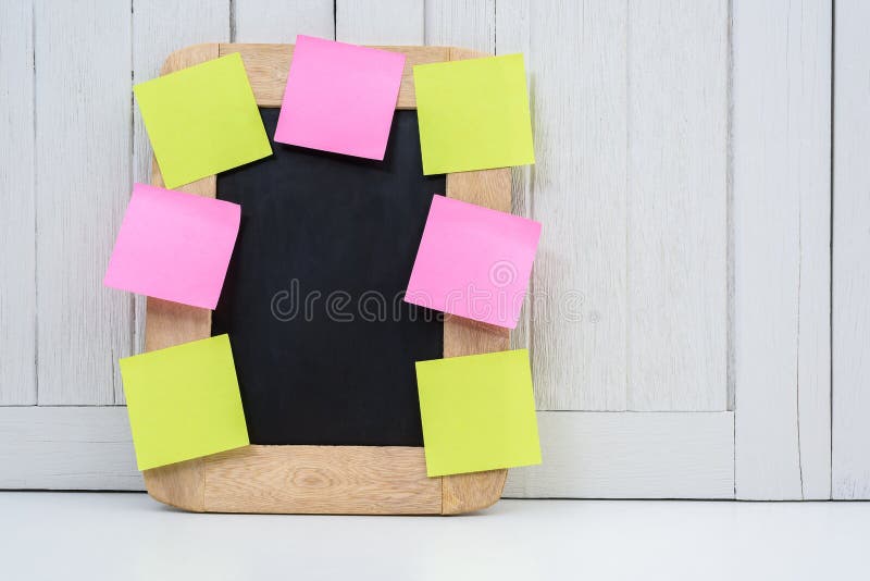 Chalkboard and Blank Sticky Note, Post Note or Post-it on Office Stock ...