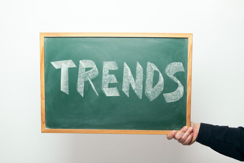 Chalkboard with TRENDS Handwritten in Chalk Stock Image - Image of ...