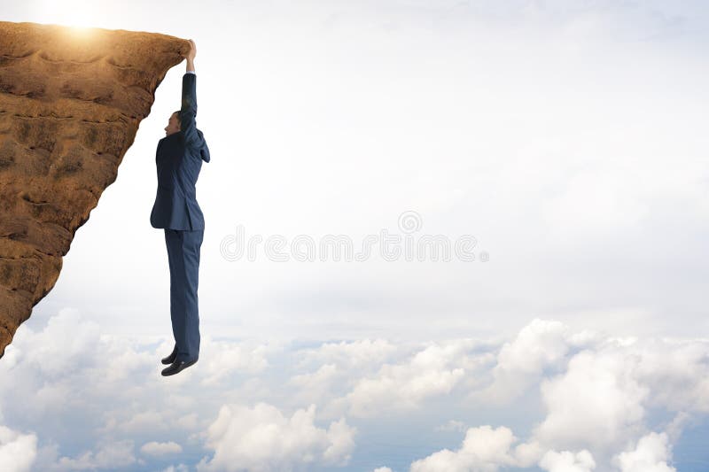 Man Clinging Edge Cliff Stock Photos - Free & Royalty-Free Stock Photos ...