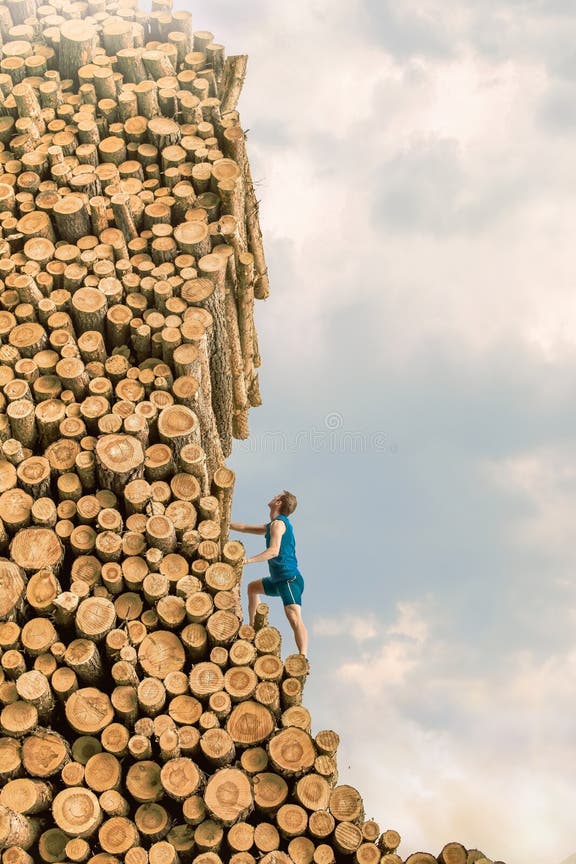 Challenge Man Climbing the Large Pile of Logs Stock Image - Image of ...