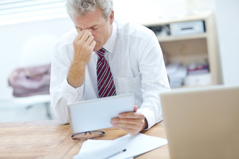 Challenging Work Causing Problems. Stressed Businessman Sitting at an ...