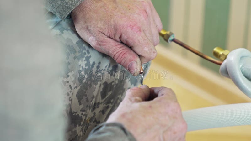 Chamfering of Copper Pipe. Process of Removing Pointed Edge at End of ...