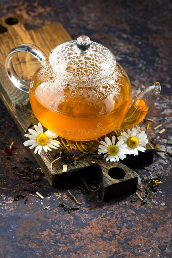 Chamomile Tea in a Glass Teapot, Vertical Top View Stock Image - Image ...