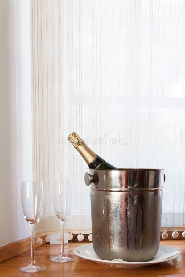 Champagne Bottle in Bucket and Two Glasses Stock Photo - Image of ...