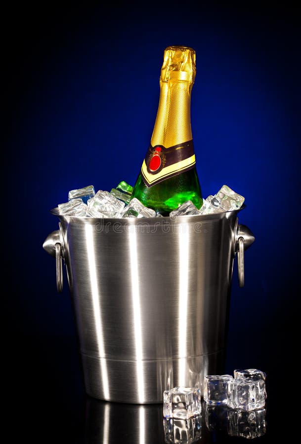 Champagne bottle in ice stock image. Image of bottle - 16218683