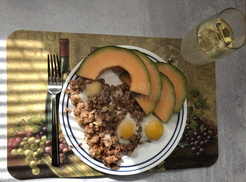 Champagne Breakfast, Corned Beef Hash with Three Poached Eggs, and ...