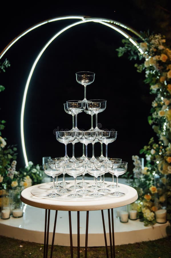 Champagne Glasses Standing in a Tower at the Party Stock Photo - Image ...