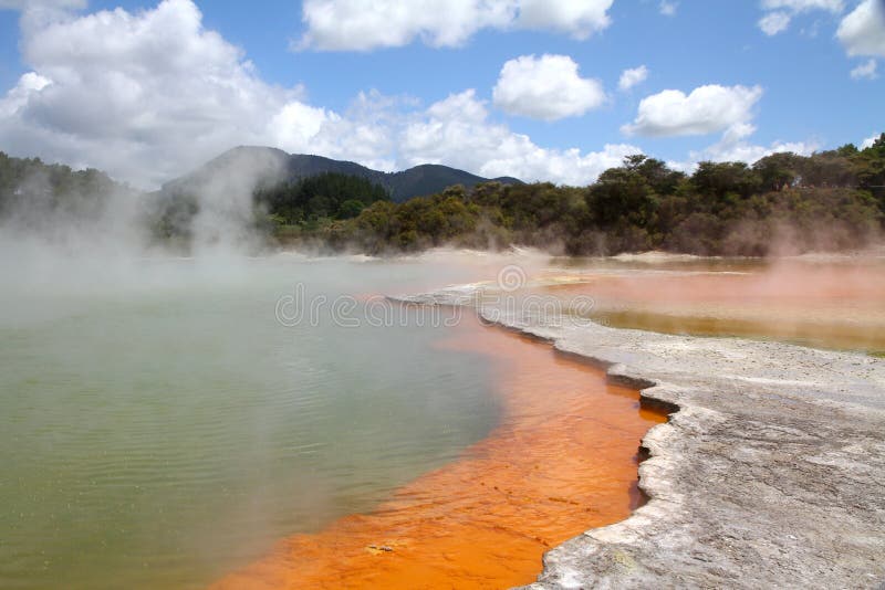 The Champagne Pool, Wai-O-Tapu Stock Photo - Image of stunning, skies ...