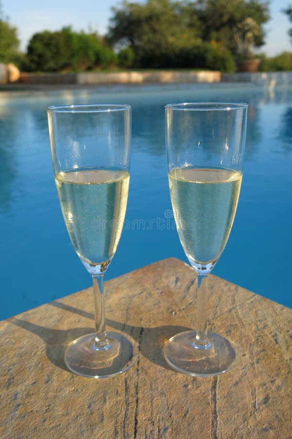 Champagne by the Swimming Pool Stock Image - Image of bubbles, alcohol ...