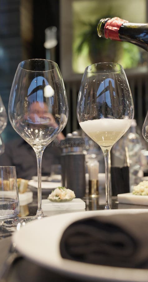 Champagne Tasting, Wine Glasses are on the Table, Stylish Table Setting ...