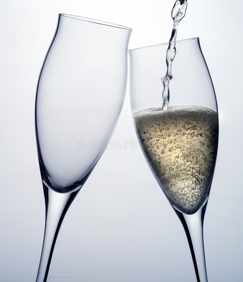 Two Champagne Glasses Against Bright Lights Stock Image - Image of ...