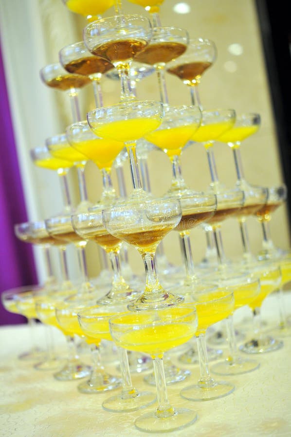 Champagne glasses tower stock image. Image of china, water - 16365877