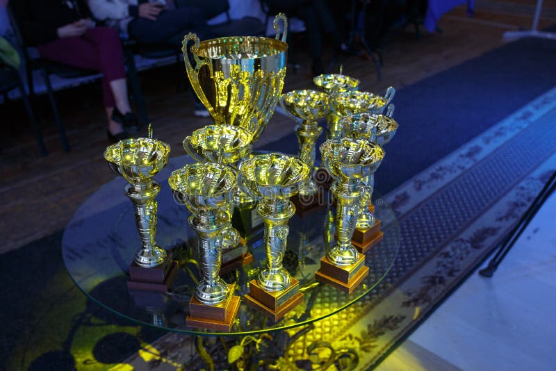 Champion Golden Trophies. Cup for the First Place Stock Image - Image ...