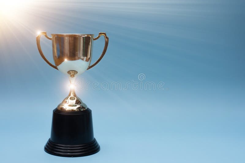 Champion Golden Trophy on Blue Background with Copy Space Stock Image ...