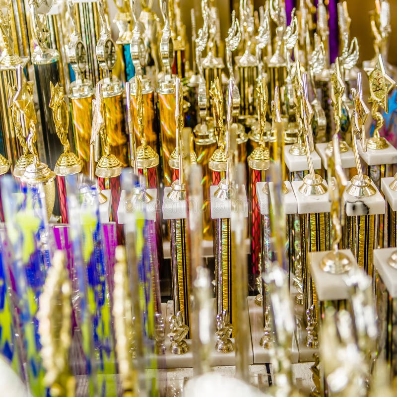 Champion Trophies Abstract on Shelf Display Stock Photo - Image of ...