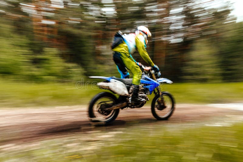 Motocross through forest stock photo. Image of adventurous - 4904348