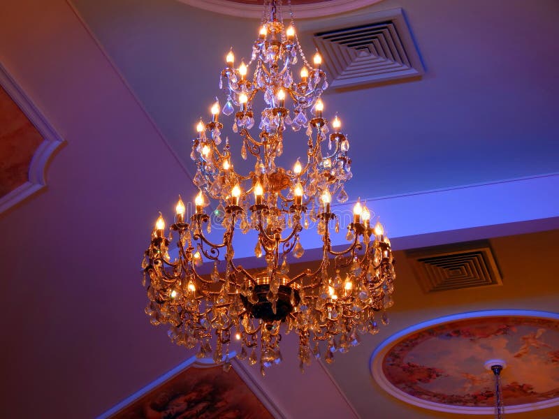 Chandelier in Brass with Blue Backlight Stock Image - Image of brass ...
