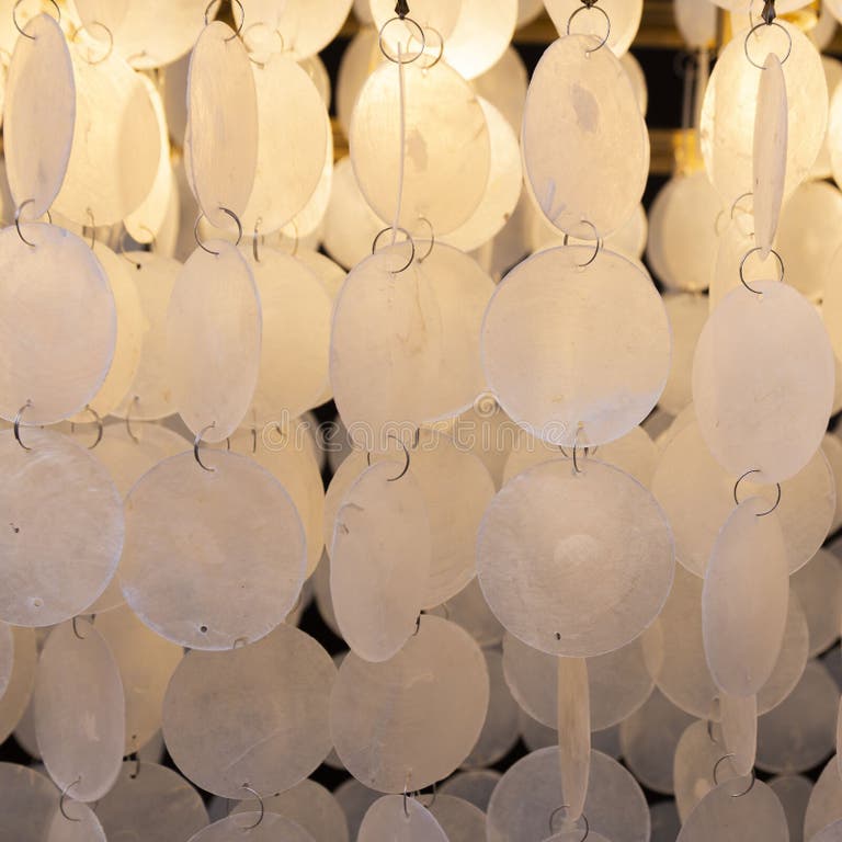 Linear Chandelier with Translucent Capiz Shells Stock Photo - Image of ...
