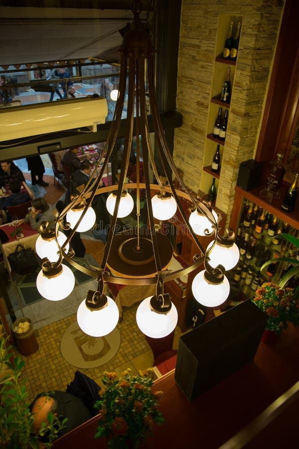 Chandelier in the Restaurant Editorial Image - Image of glow, light ...