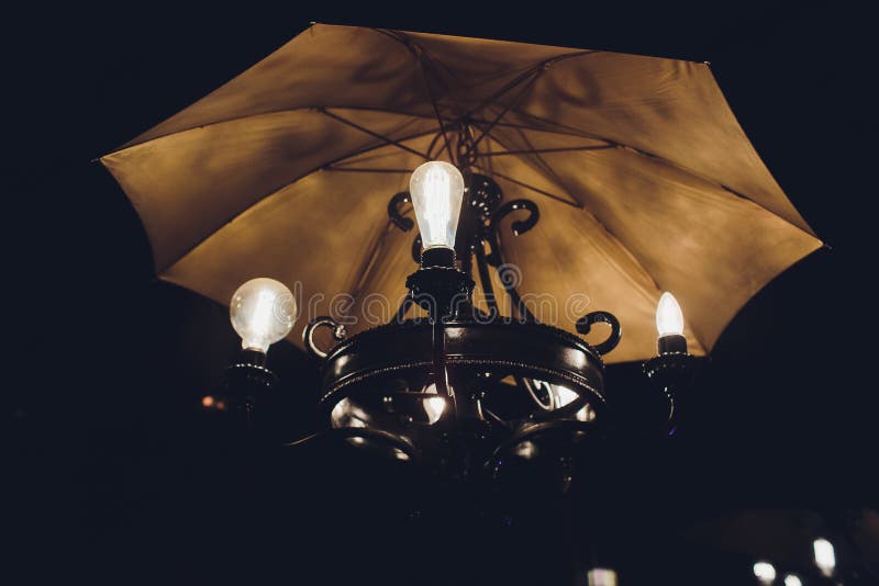 Chandelier in Umbrella Form with Light Inside. Stock Image - Image of ...