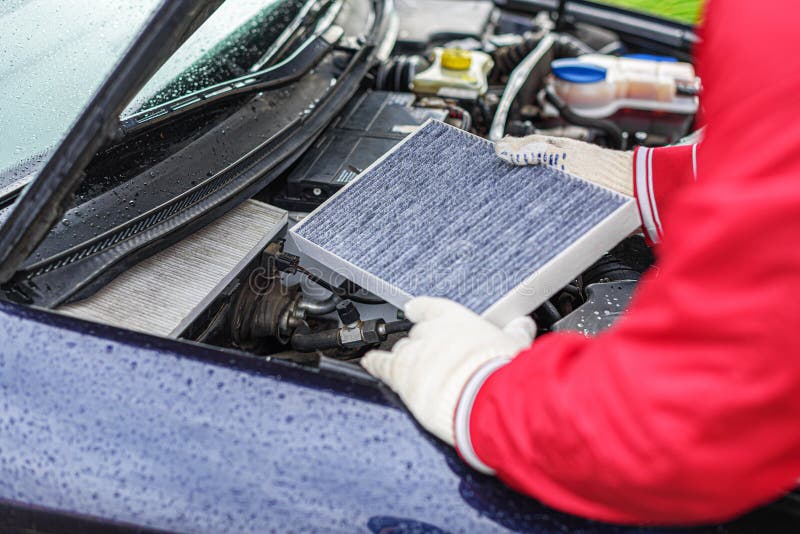 Change the Filter on the Car Engine during Vehicle Maintenance. Stock ...