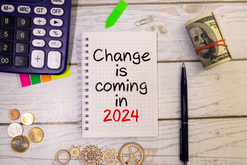 CHANGE COMING in 2024. Red and Black Font on White Paper on the Table ...