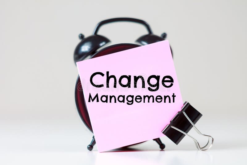 Change Management Text on a Sticker for Reminders with an Alarm Clock ...