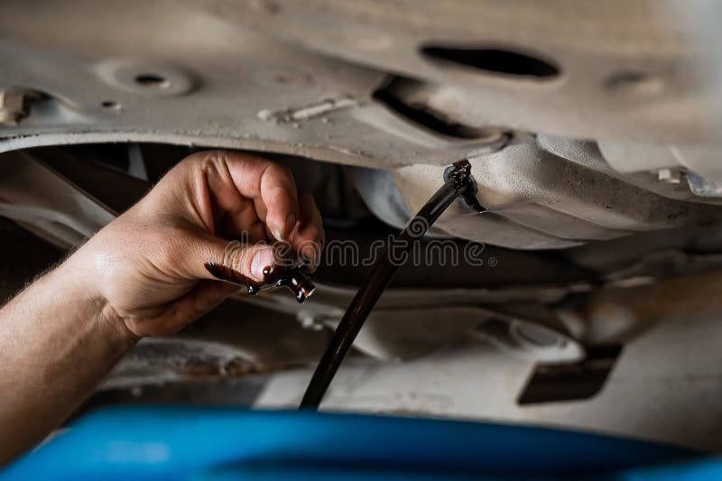 Change of Old Oil in a Car Engine. Stock Photo - Image of fuel, auto ...