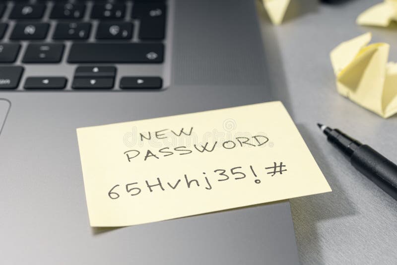 Change of Password To a Stronger One. Message on Sticky Note on Laptop ...