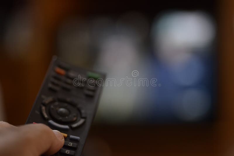Change TV Channel with Remote Control Stock Photo - Image of device ...